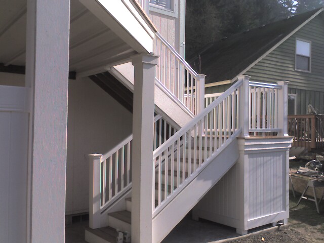 Modhm Designs Vinyl Deck Rail: Timber tech Stairs with Radiance Railing